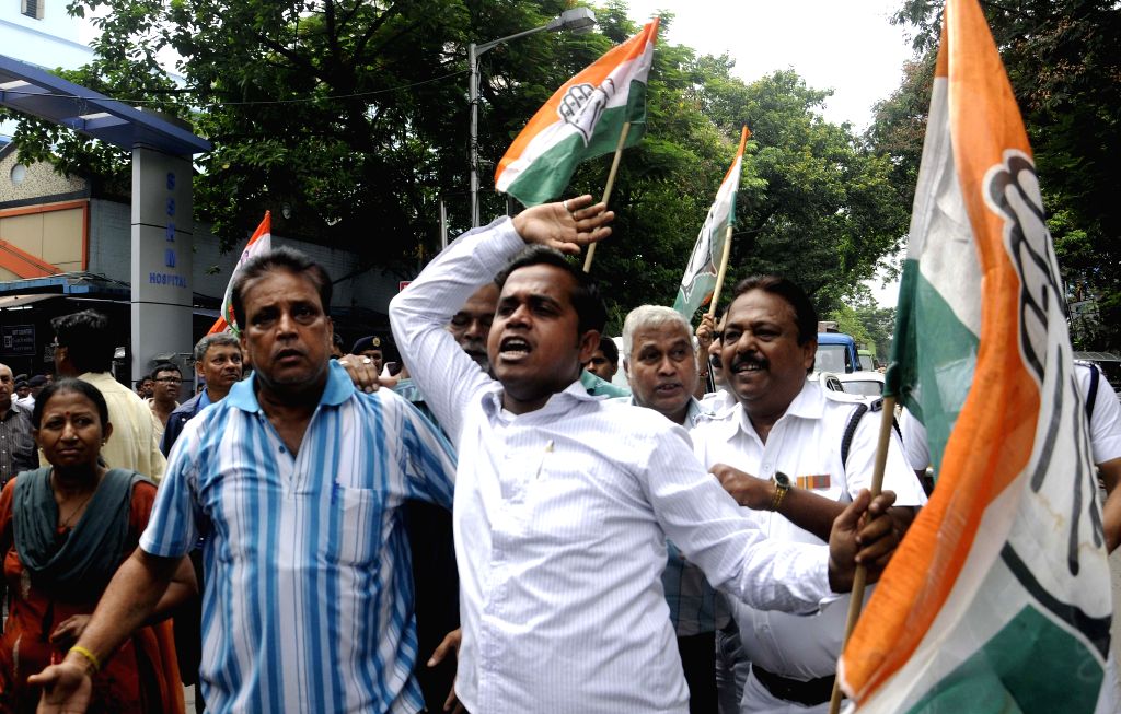 Congress demonstrate against the transfer of Pradip Mitra