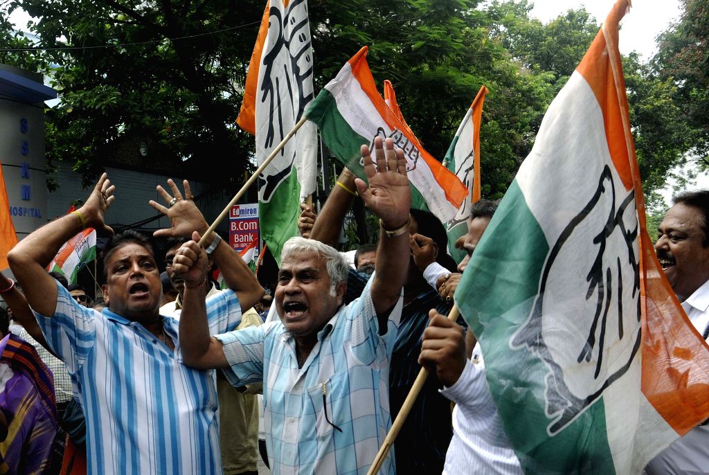 Congress demonstrate against the transfer of Pradip Mitra