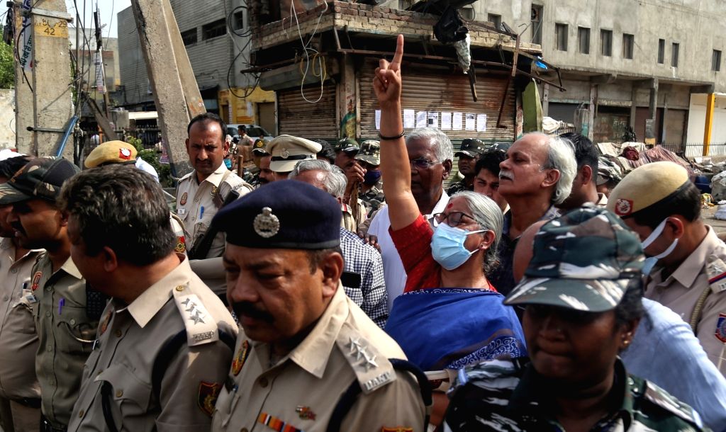 CPI leaders D. Raja and Annie Raja arrive to visit the violence-hit ...
