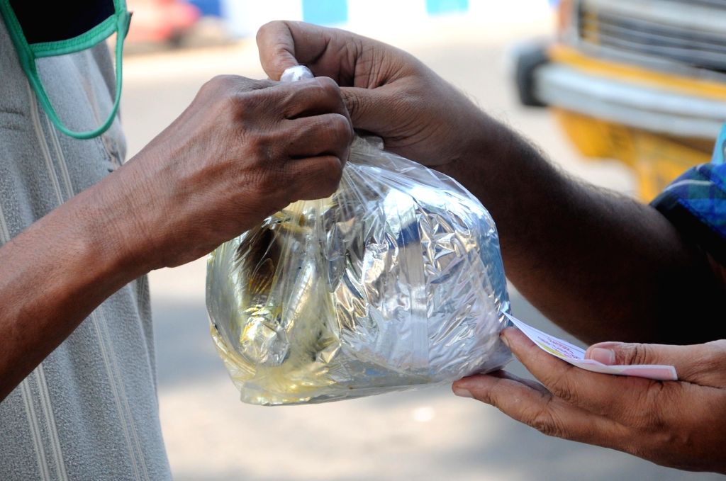 Food distributed among the poor during People's Canteen organised by CPI