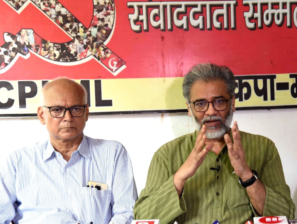 CPI(ML) general Secretary Dipankar Bhattacharya addresses a press ...