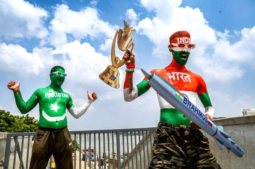 Cricket fans paint bodies in Indian and Pakistan flag colours ahead of ...