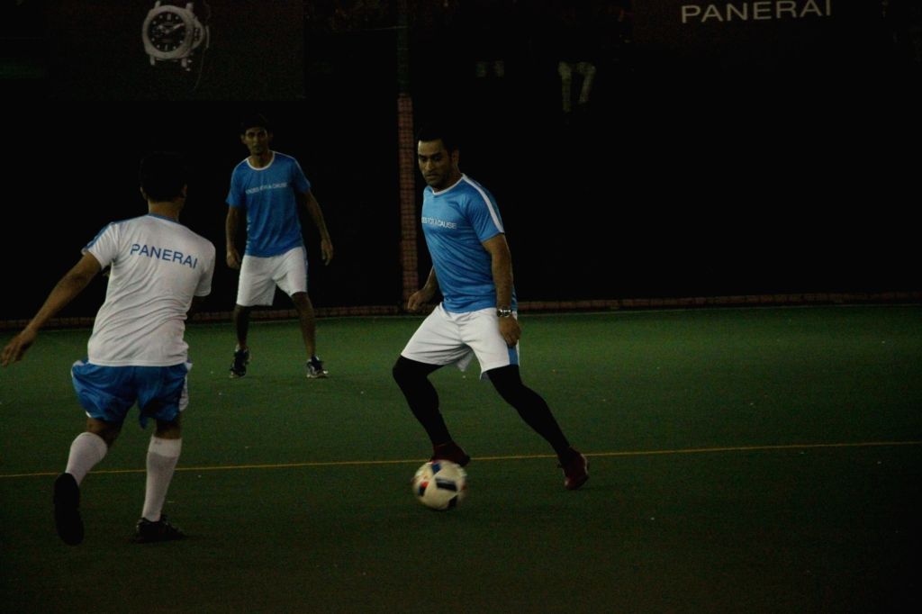 MS Dhoni during a football match event