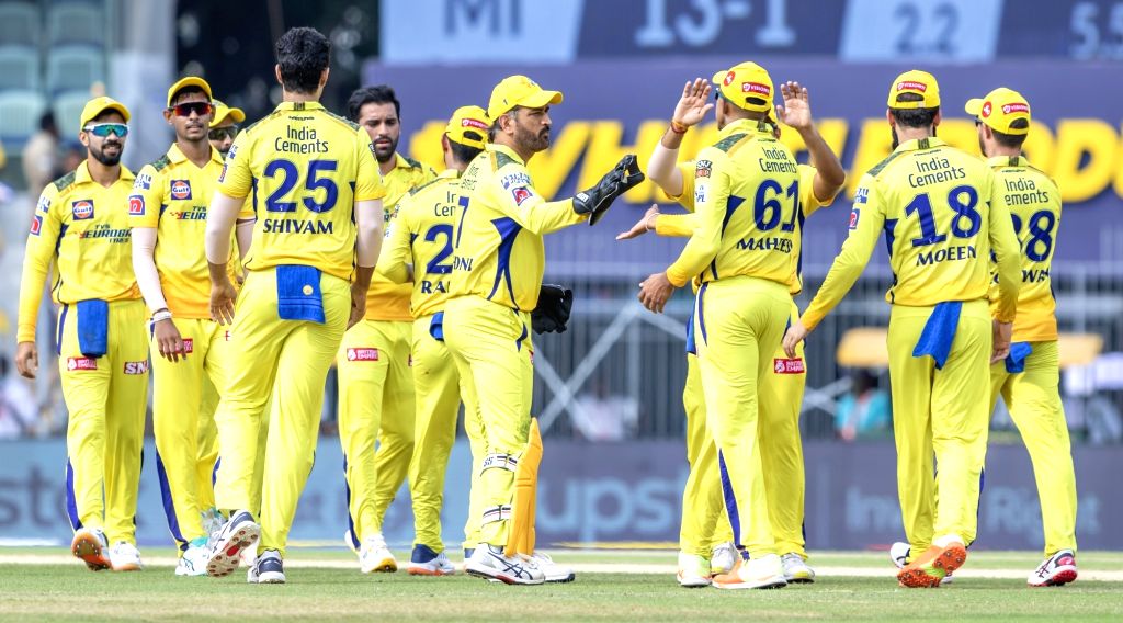 Chennai : CSK's players celebrate the dismissal of MI's Ishan Kishan