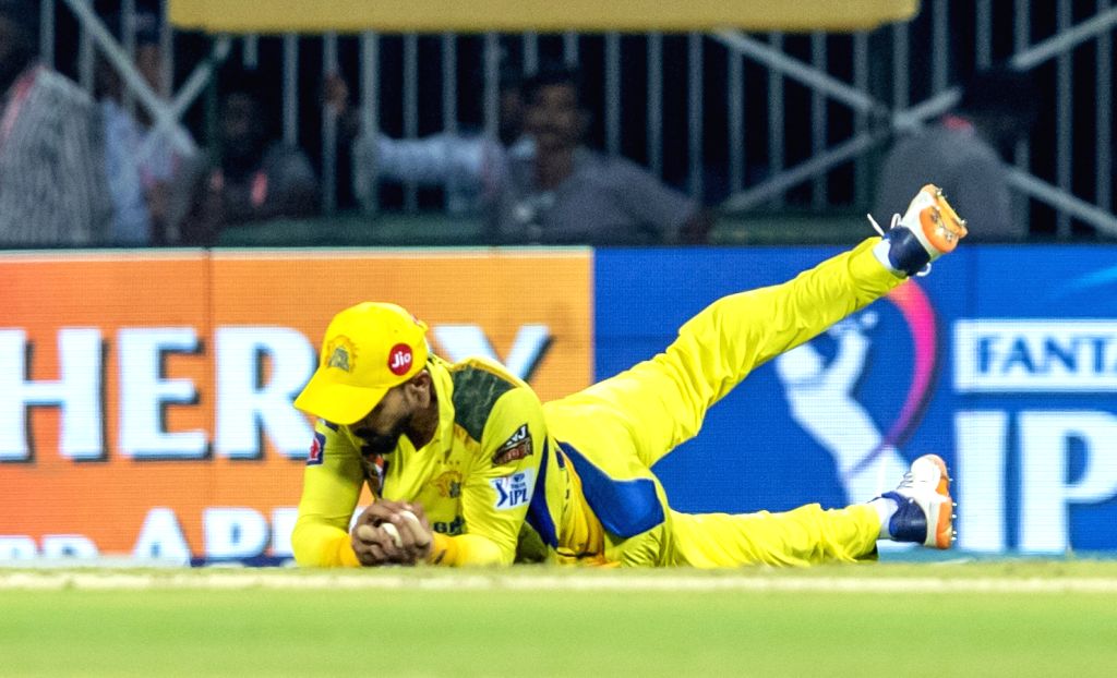 CSK's Ruturaj Gaikwad dives to take a successful catch