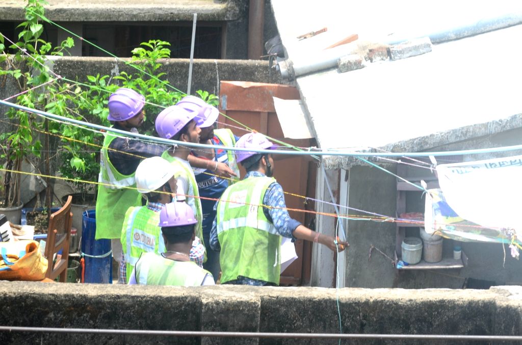 Damaged houses are being demolished at Bowbazar area