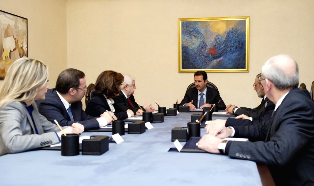 Bashar al-Assad meets with his official delegation to the Geneva II ...