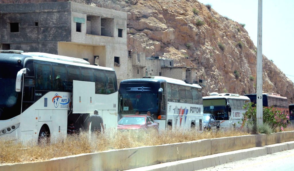 SYRIA-DAMASCUS-REBEL-EVACUATION