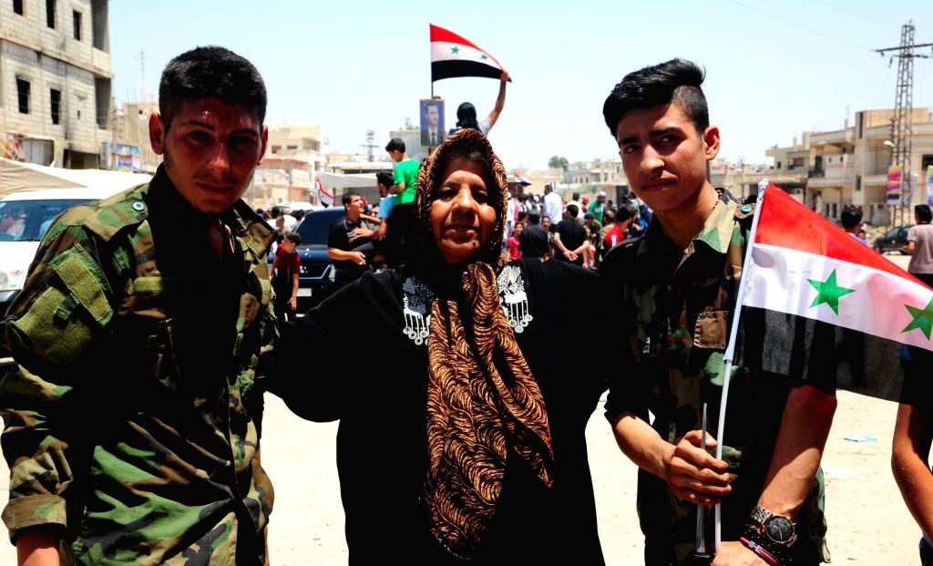 SYRIA-DARAA-PRO-GOVERNMENT-RALLY
