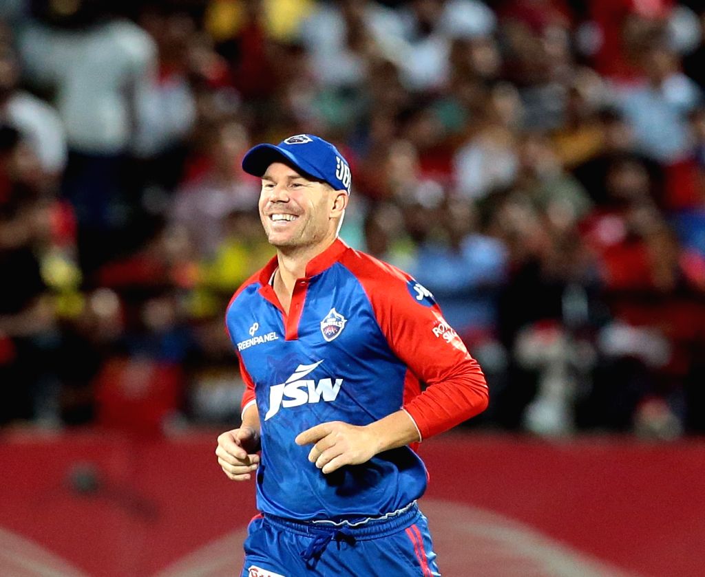: Dharamshala : DC's captain David Warner celebrates the dismissal of ...