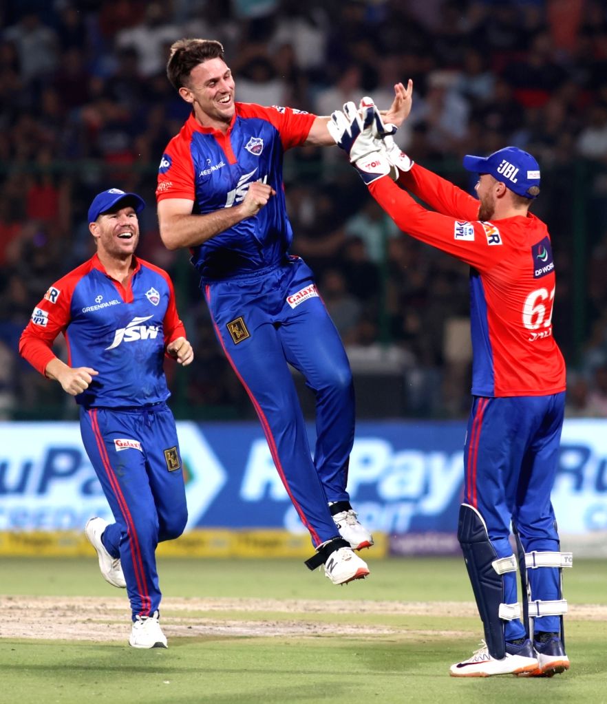 DC's Mitchell Marsh with teammate Phil Salt celebrate the dismissal of ...