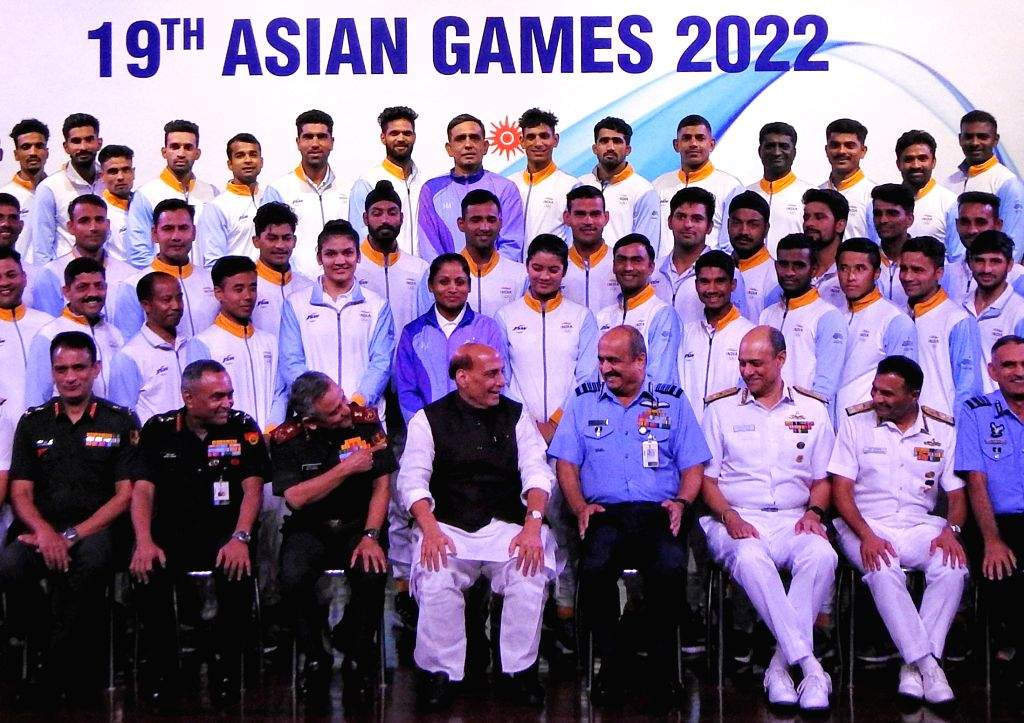 Defence Minister Rajnath Singh with the Asian Games Medal winners