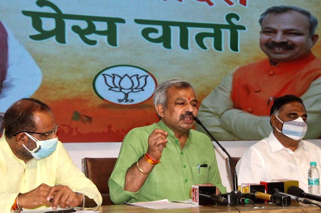 : New Delhi: Delhi BJP President Adesh Gupta, LOP Ramvir Singh Bidhuri ...