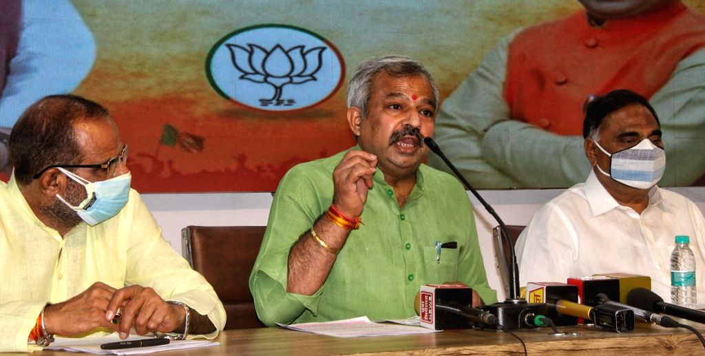 : New Delhi: Delhi BJP President Adesh Gupta, LOP Ramvir Singh Bidhuri ...