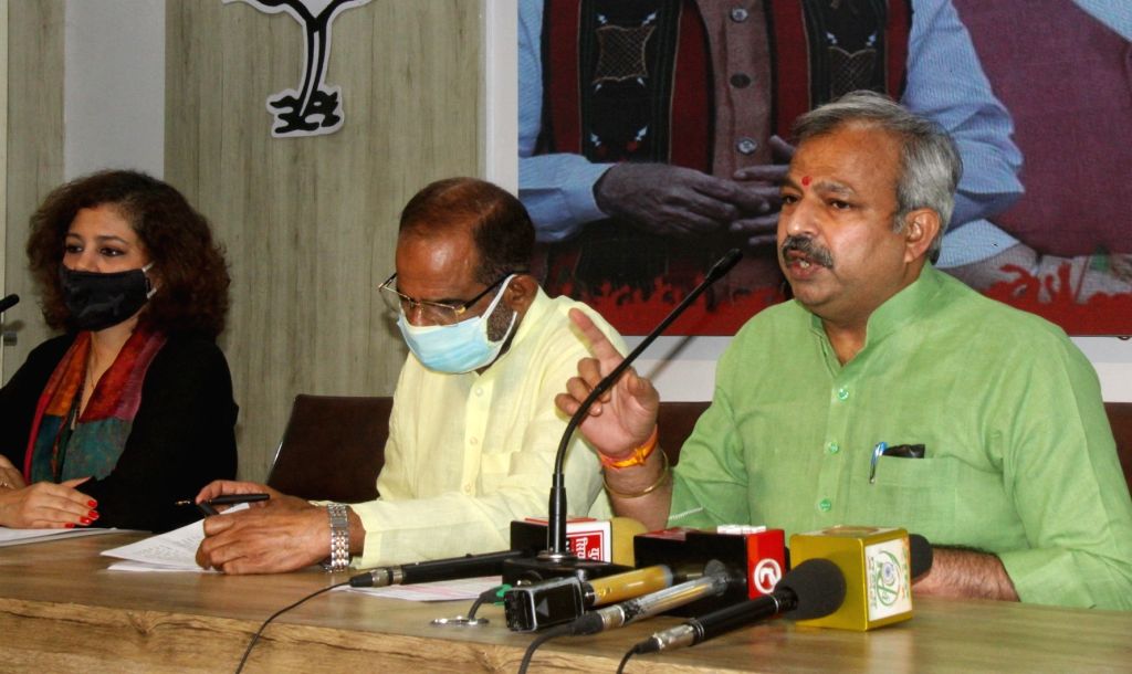 : New Delhi: Delhi BJP President Adesh Gupta, LOP Ramvir Singh Bidhuri ...