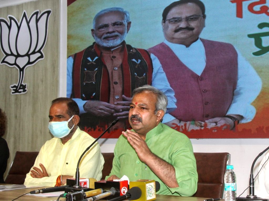 : New Delhi: Delhi BJP President Adesh Gupta, LOP Ramvir Singh Bidhuri ...