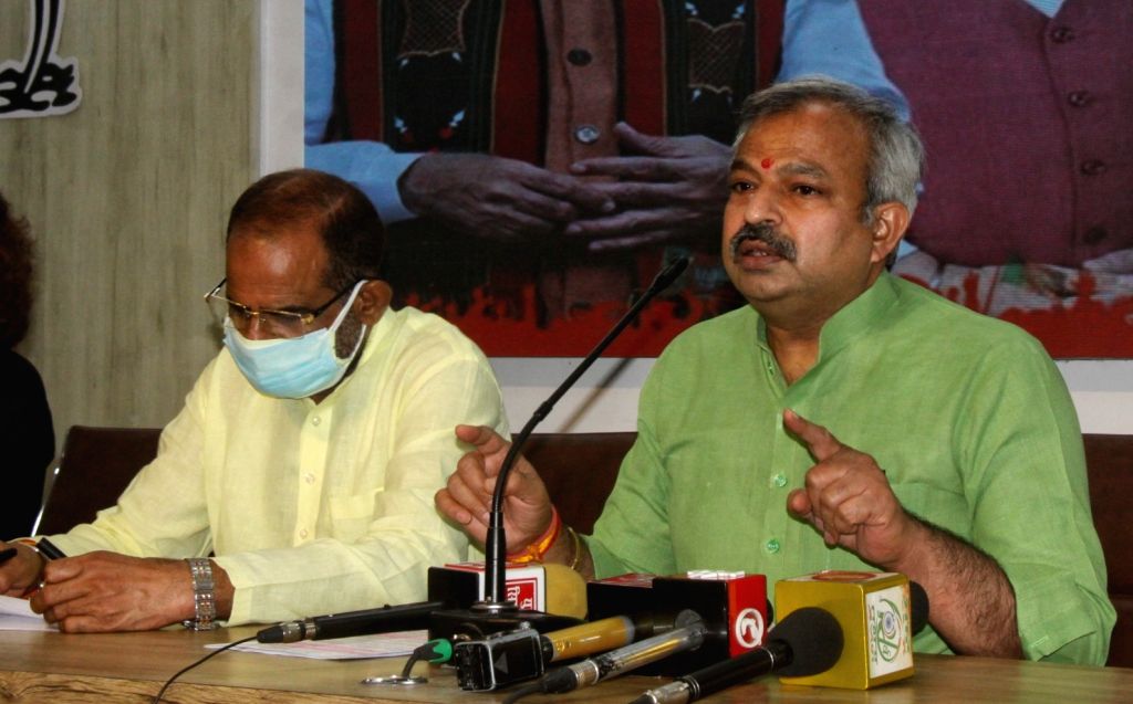 : New Delhi: Delhi BJP President Adesh Gupta, LOP Ramvir Singh Bidhuri ...