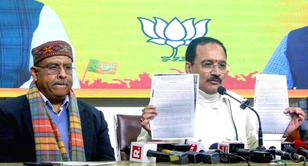 Delhi BJP President Virender Sachdeva addresses a press conference