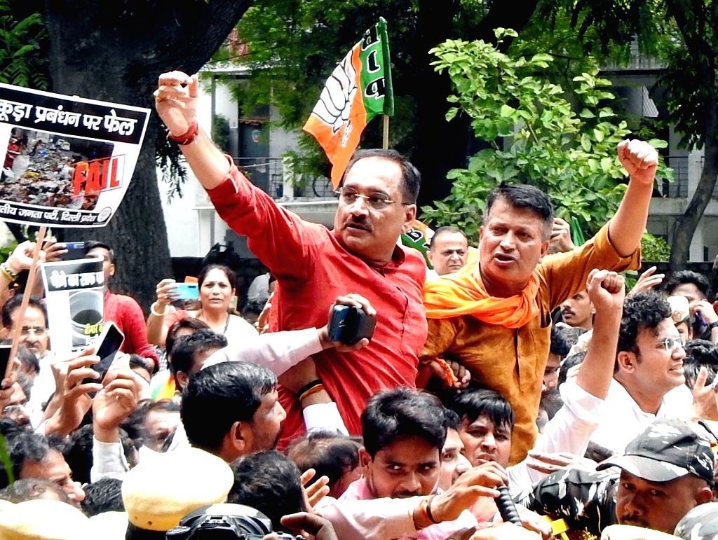 Delhi BJP President Virender Sachdeva with other party leaders and ...