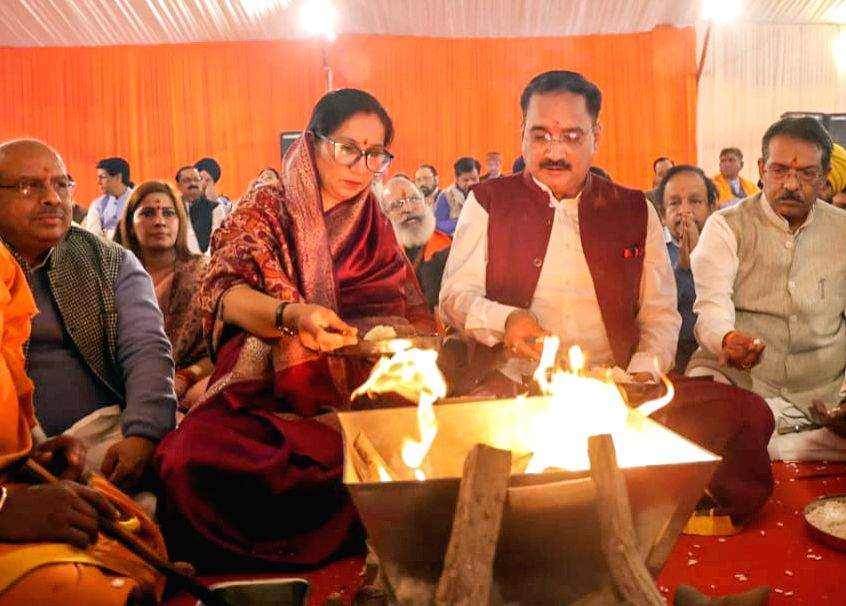 Delhi BJP President Virendra Sachdeva, along with his wife and other ...