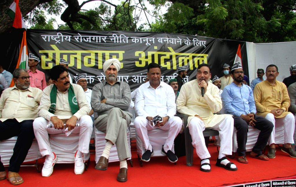 Delhi Cabinet Minister Gopal Rai addresses during a 'Rojgar Aandolan