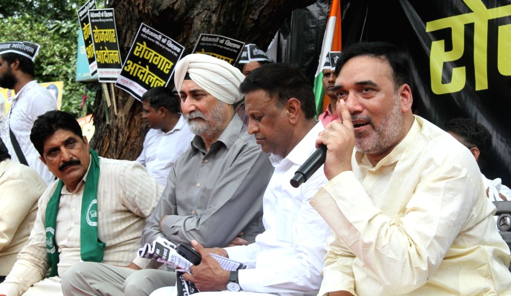 Delhi Cabinet Minister Gopal Rai addresses during a 'Rojgar Aandolan