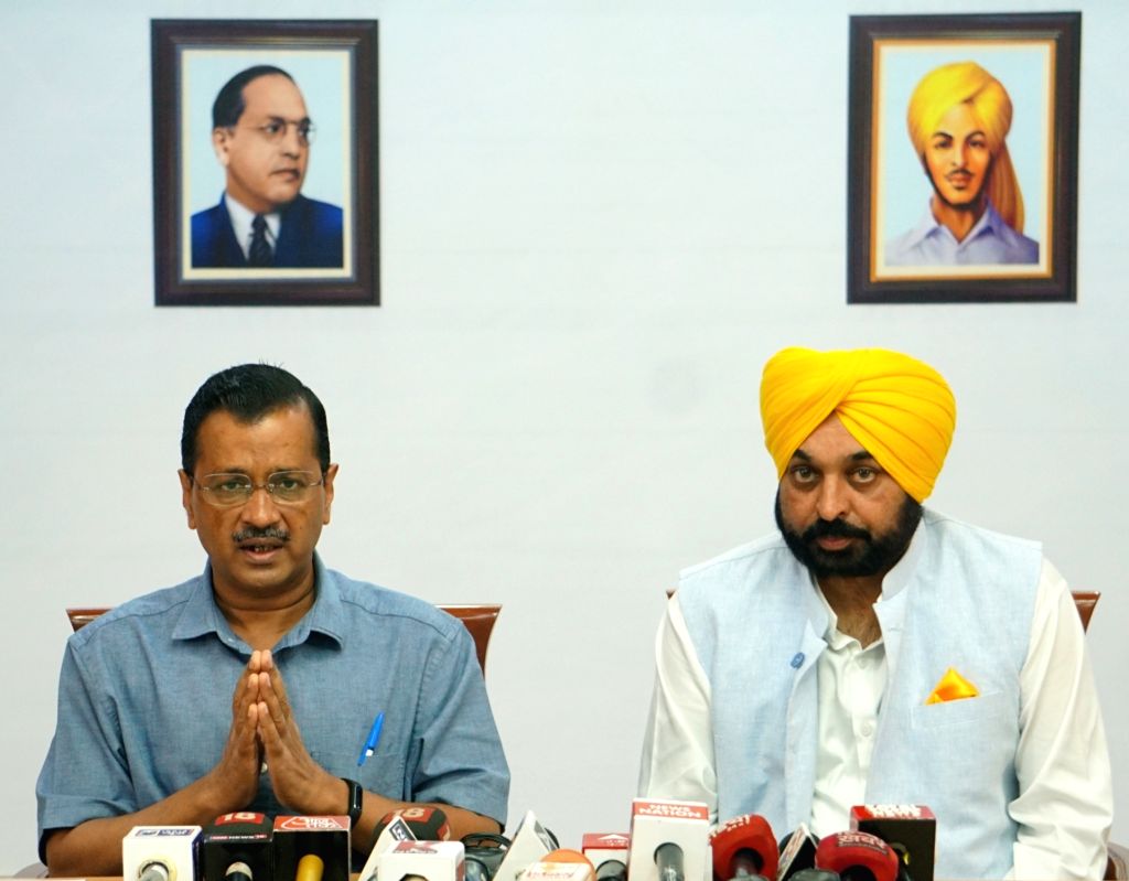 Delhi CM Arvind Kejriwal along with Punjab CM Bhagwant Mann address a ...