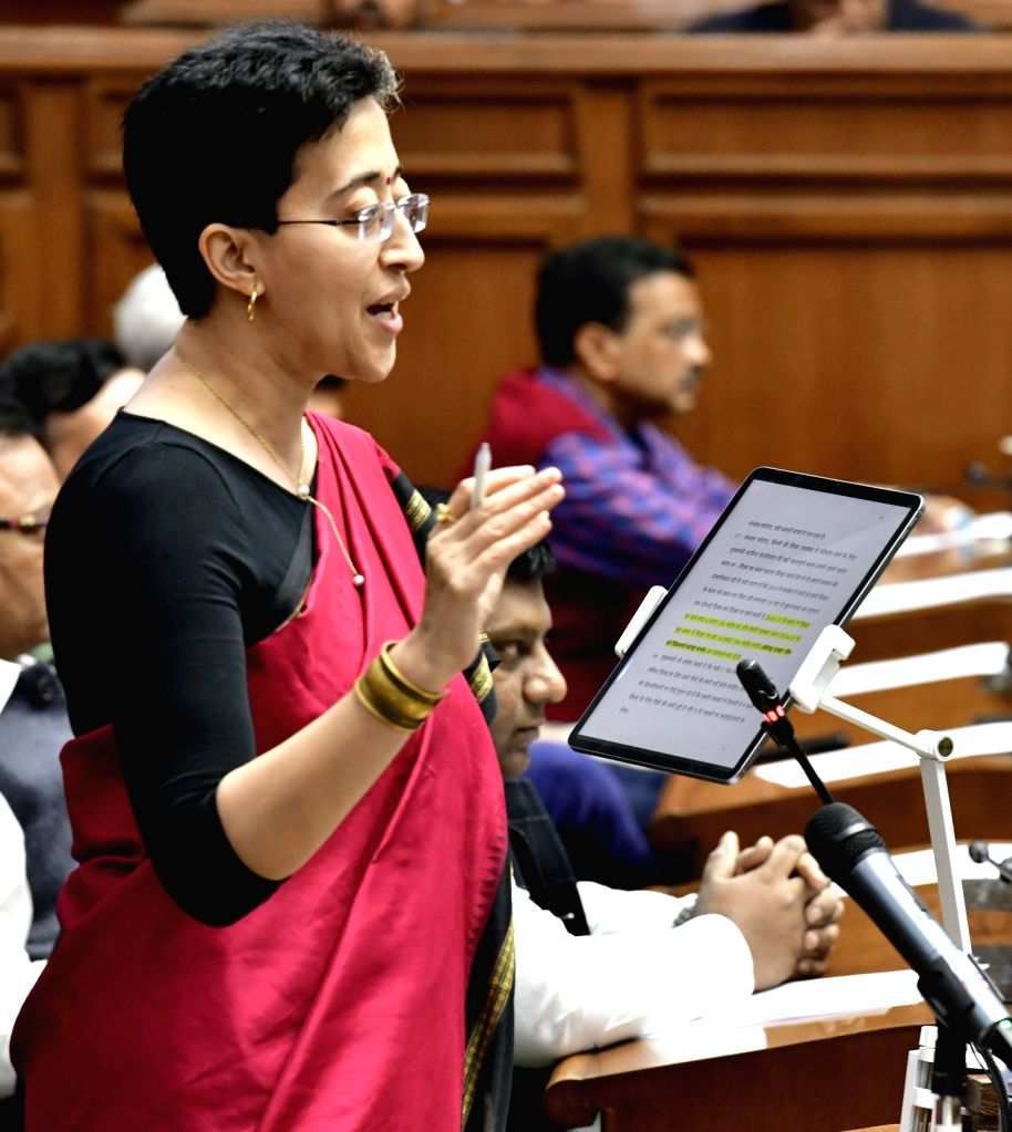 Delhi Finance Minister Atishi Singh speaks during the presentation of ...