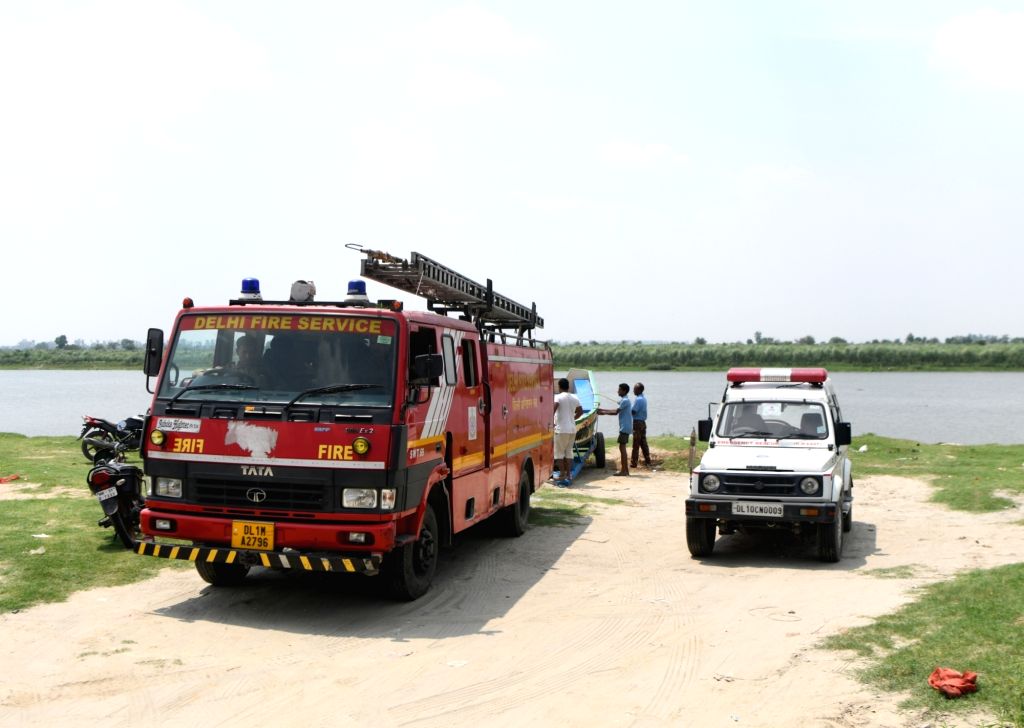 Delhi Police vehicle and fire tender vehicle at the spot during a ...