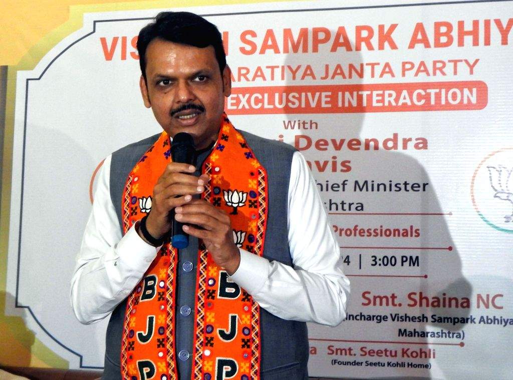 Deputy Chief Minister of Maharashtra Devendra Fadnavis interacts with ...