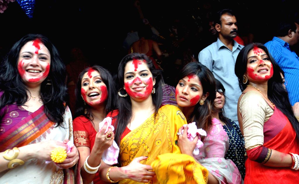 Celebrities during 'Sindoor Khela' at Chalta Bagan Durga Puja pandal