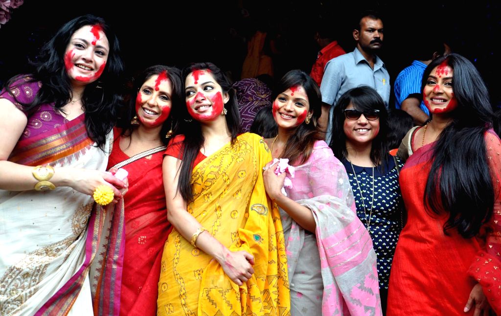 Celebrities during 'Sindoor Khela' at Chalta Bagan Durga Puja pandal