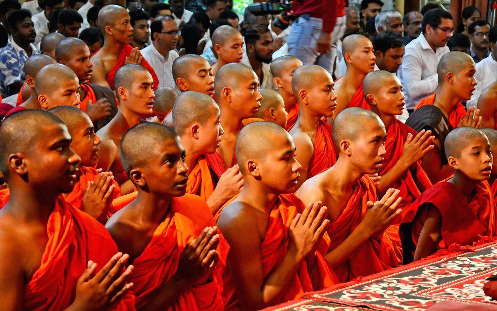 Devotees and monks observe Buddha Purnima