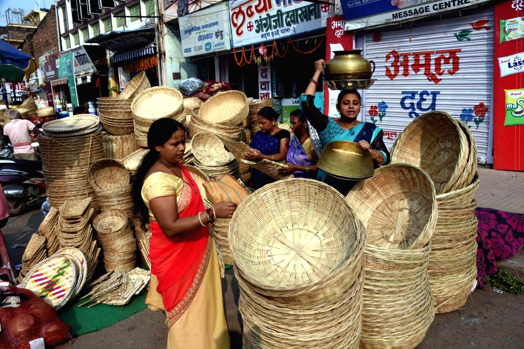 : Patna:Devotees buy bamboo baskets and other items ahead of Chhat Puja.