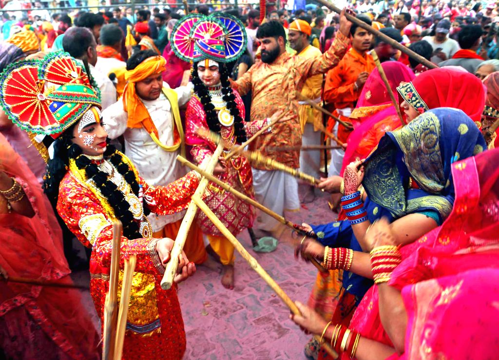 Devotees celebrate 'chhadimar holi' with sticks