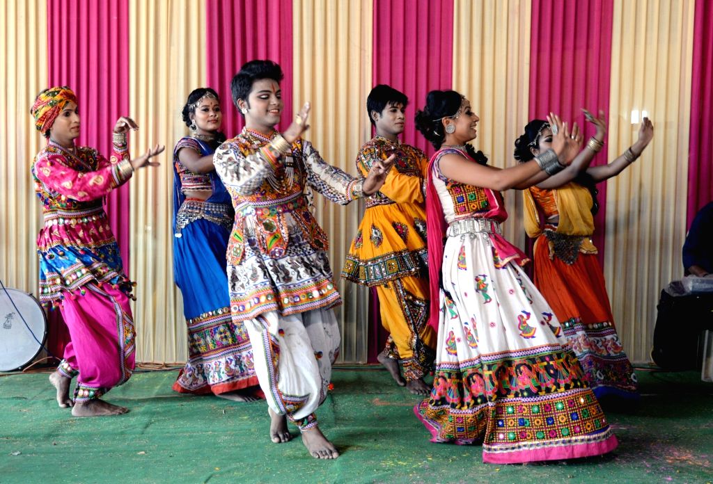 Devotees dance with traditional songs at Shyam Mandir on the occasion ...