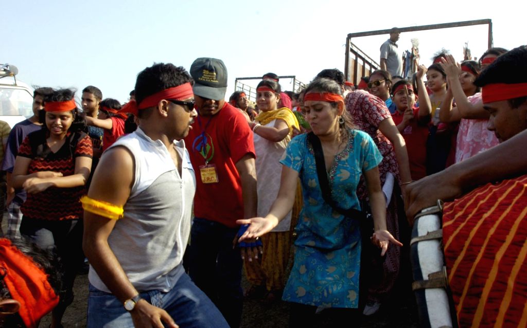 Devotees dancing on the beats of "Dhak" before the immersion of Goddess ...