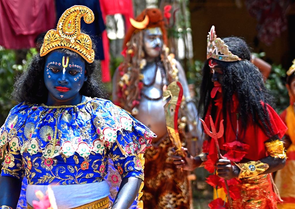 : Agartala: Devotees dressed as Hindu deities during the 'Shiber Gajan