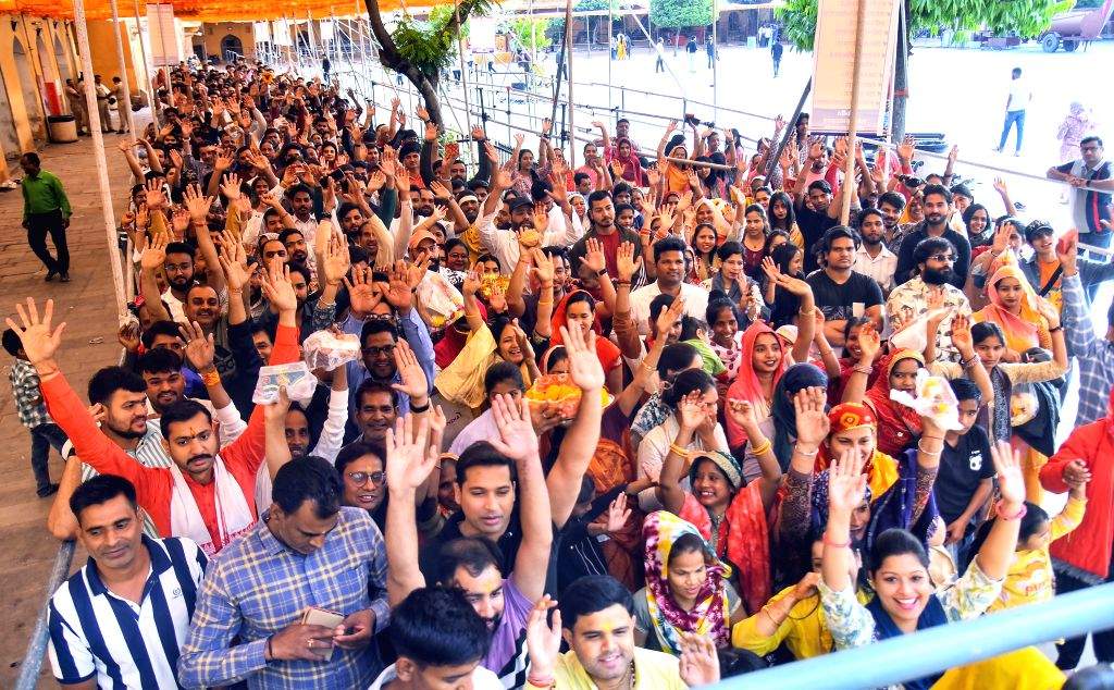 Devotees gather at the famous Shila Mata Temple