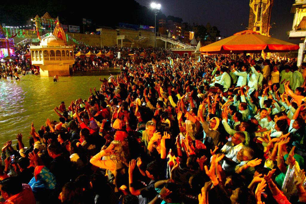 Devotees gather to offer prayers at Har Ki Pauri ghat.