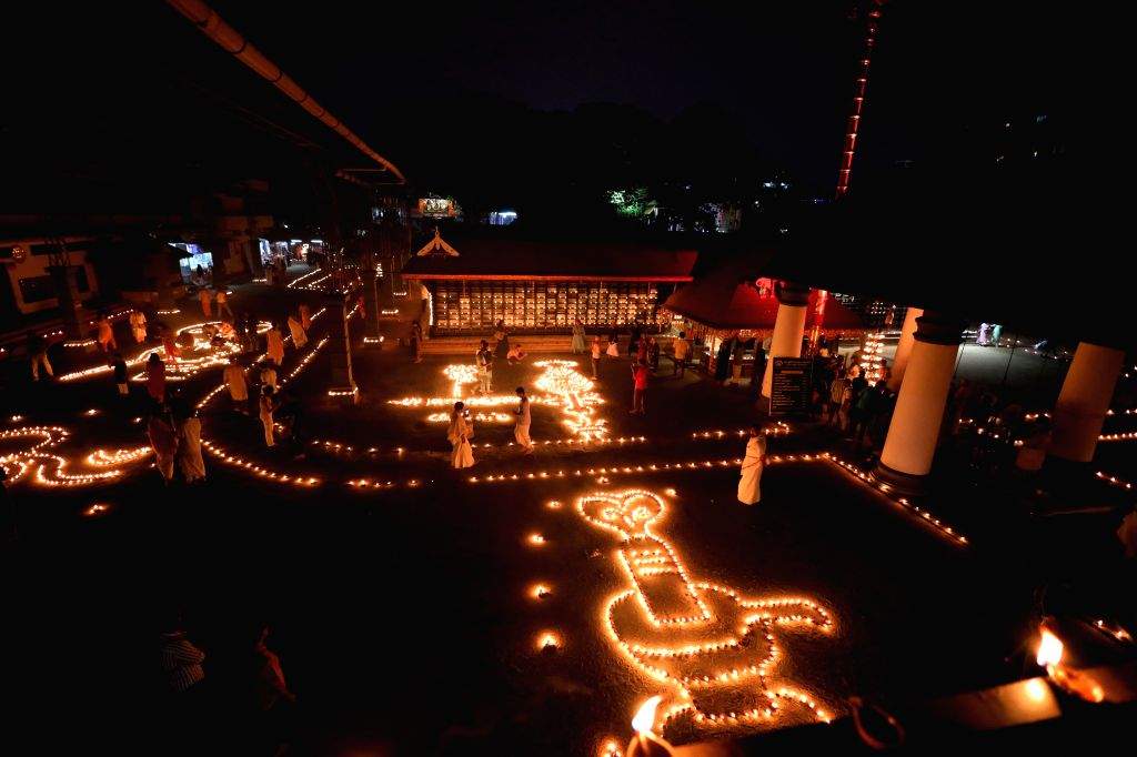 Devotees light earthen lamps on the occasion of Diwali festiwal at ...