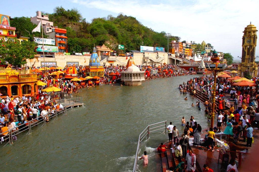 : Haridwar : Devotees take a dip in the holy river of Ganga on the ...