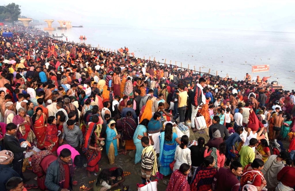 : Patna:Devotees take bath in the Ganga River on the occasion of ...