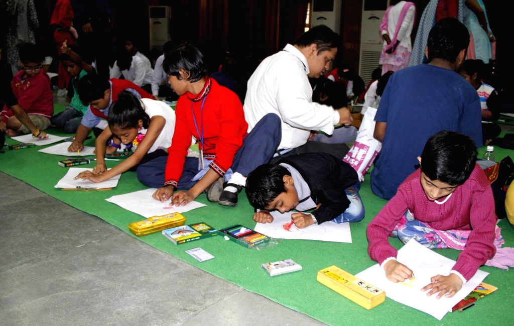 Differently-abled children take part in a drawing competition organised ...
