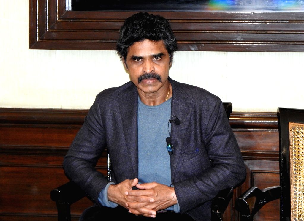 Director Shankar Naidu poses for a photo at the press conference