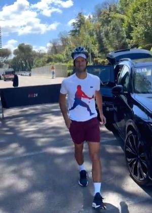 Djokovic wears helmet at Italian Open a day after water bottle falls on ...
