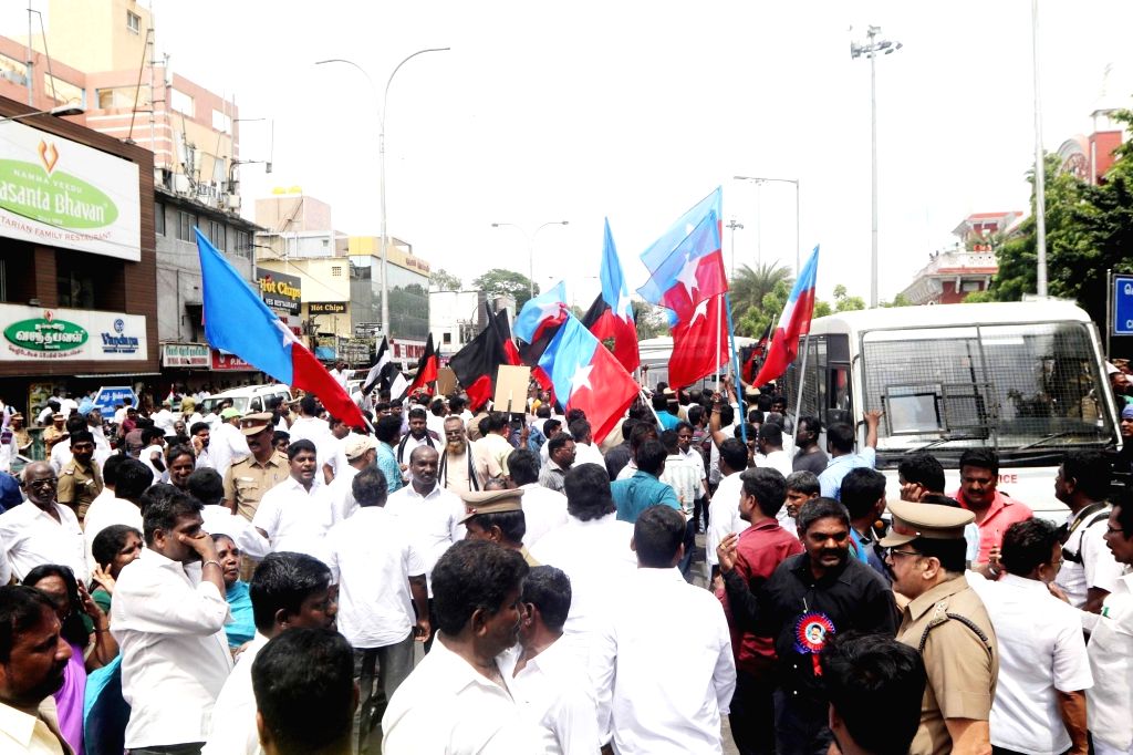 DMK MP Kanimozhi detained with party workers during a protest rally