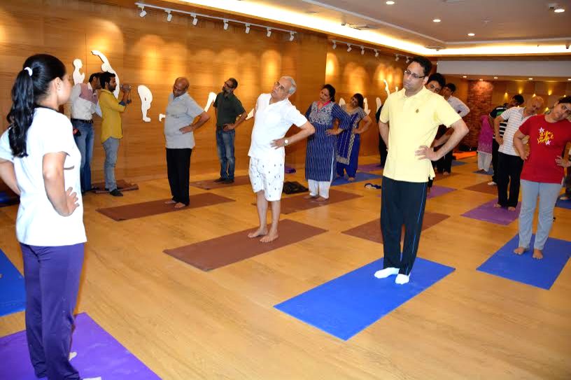 AIIMS doctors perform Yoga ()