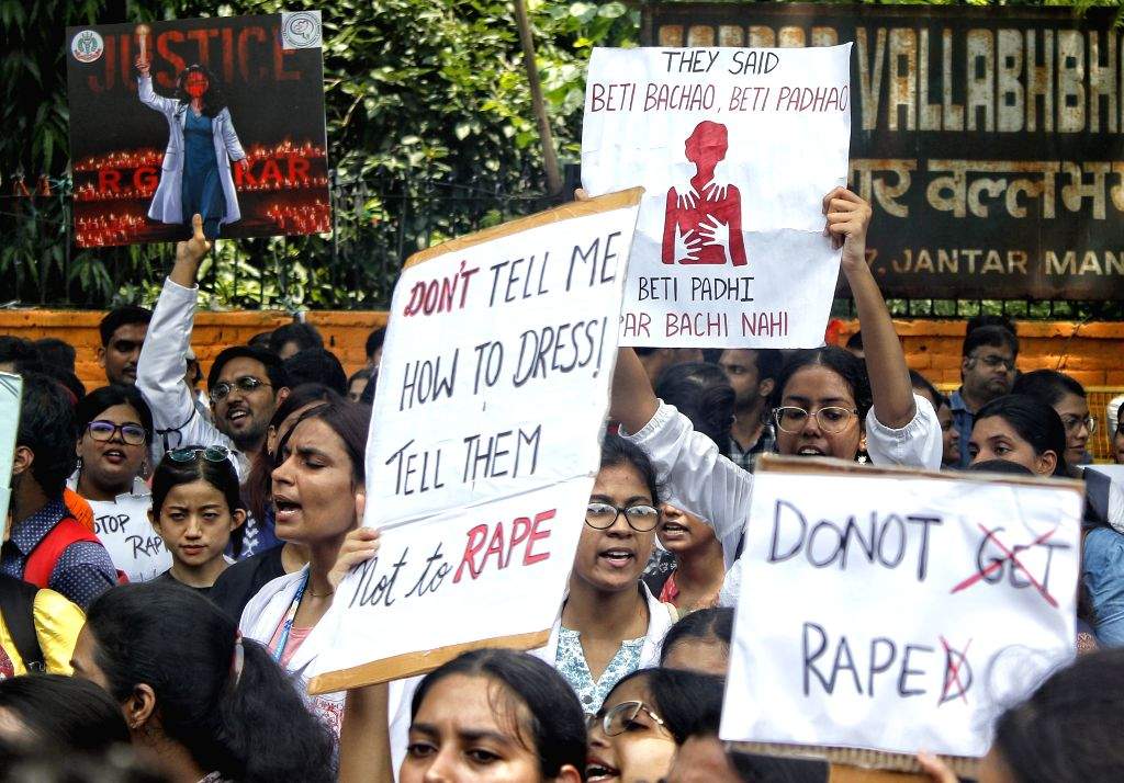 Doctors stage a protest over the rape and murder of a trainee doctor at ...