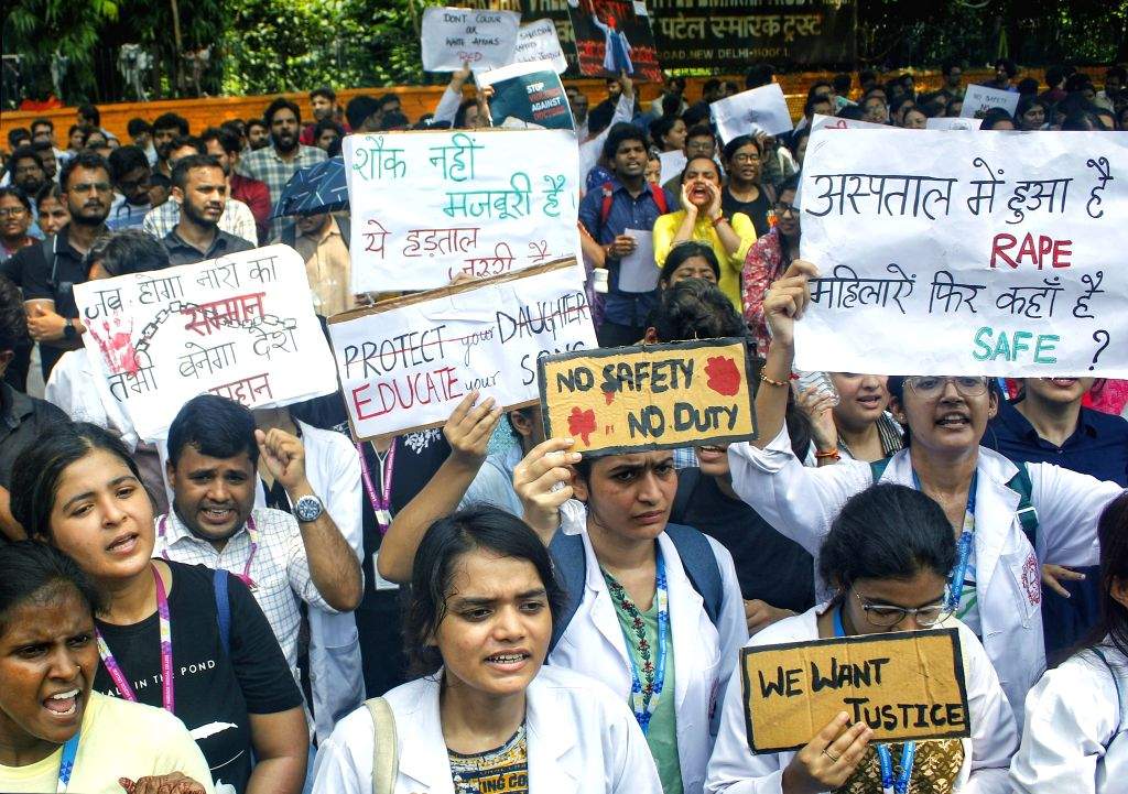 Doctors stage a protest over the rape and murder of a trainee doctor at ...